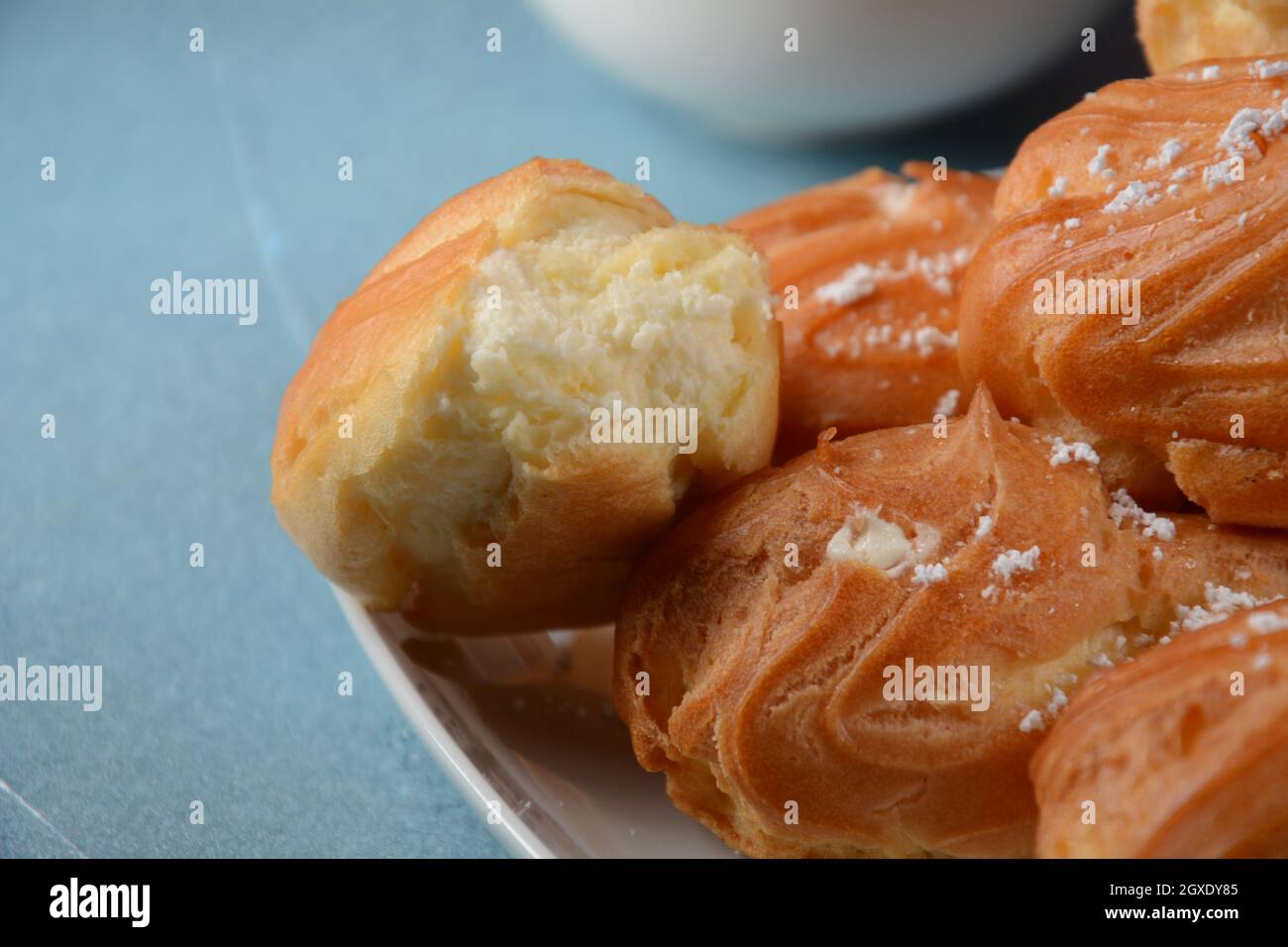 Traditional french dessert eclair with custard Stock Photo - Alamy