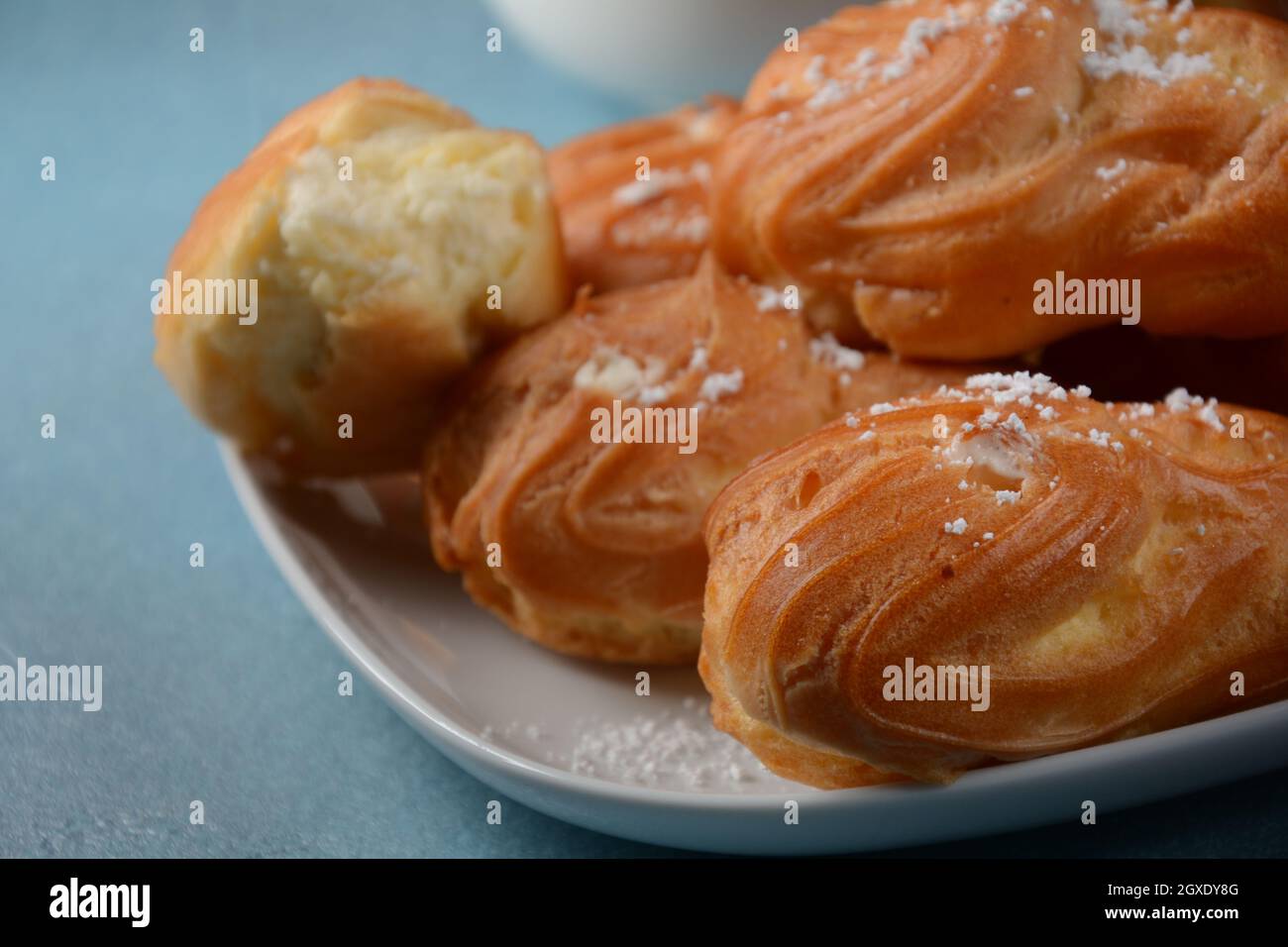 Traditional french dessert eclair with custard Stock Photo - Alamy