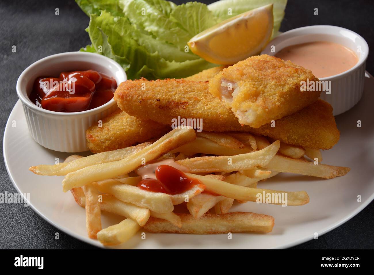 Traditional English Food - Fish and Chips. Fried fish filets and crispy ...