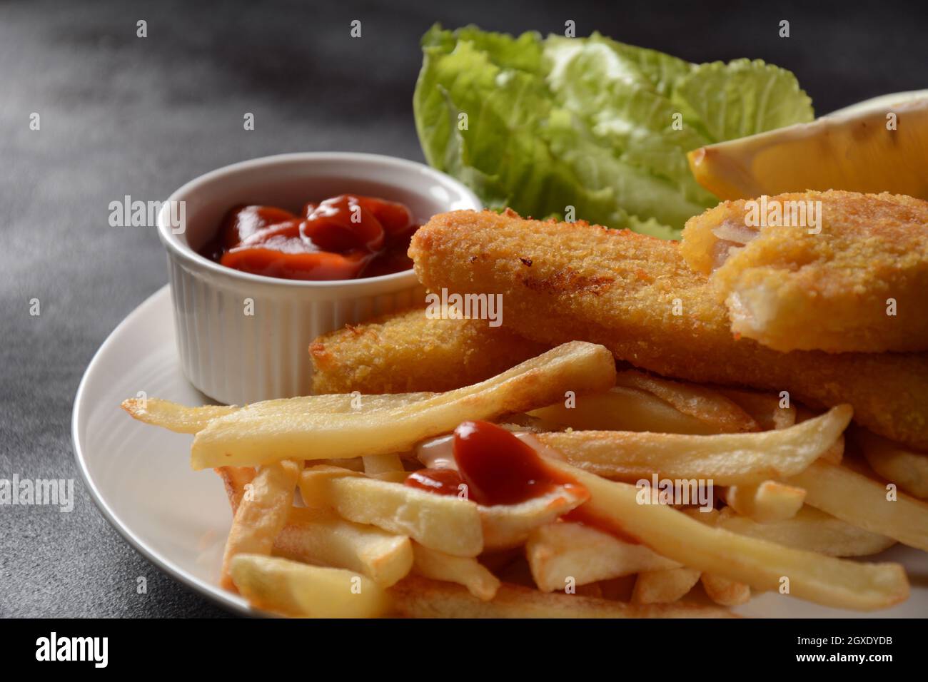 Traditional English Food - Fish and Chips. Fried fish filets and crispy ...