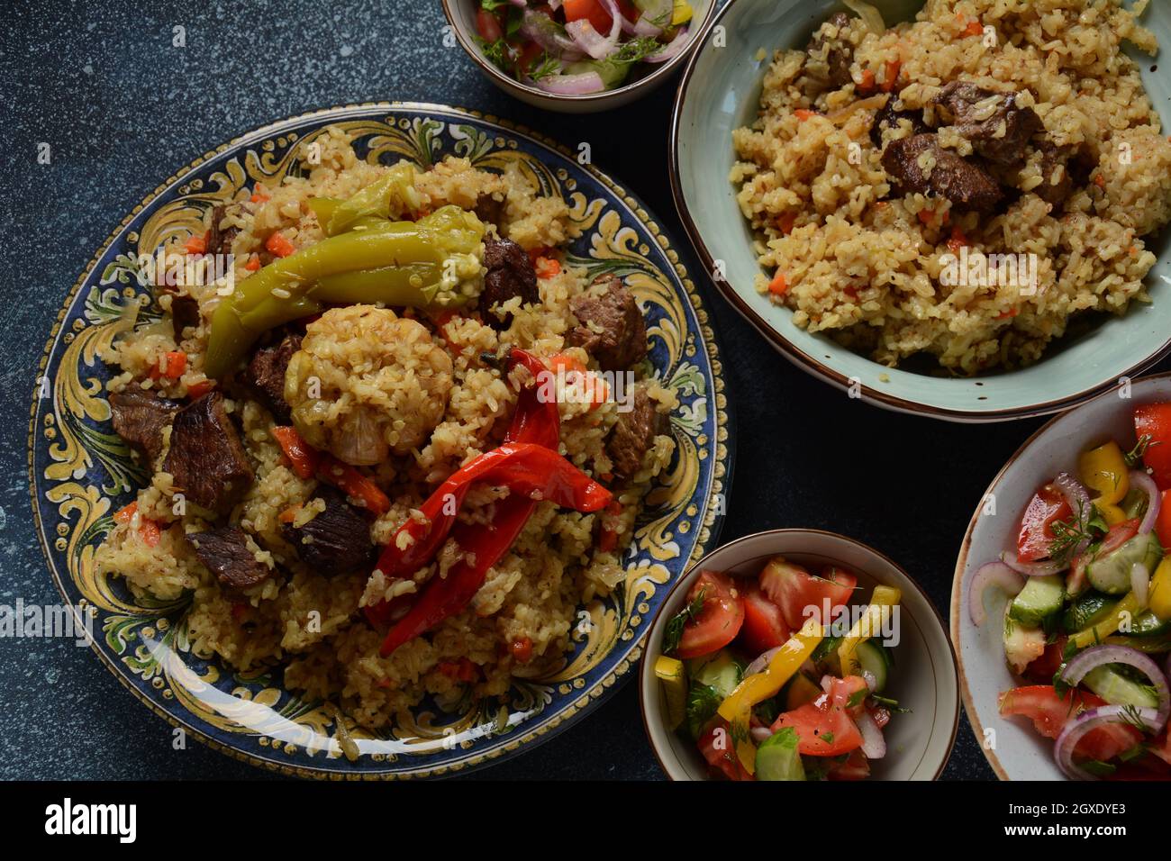 Uzbek cuisine (food) pilaf (plov), salad achichuk (achuchuk).Mutton ...