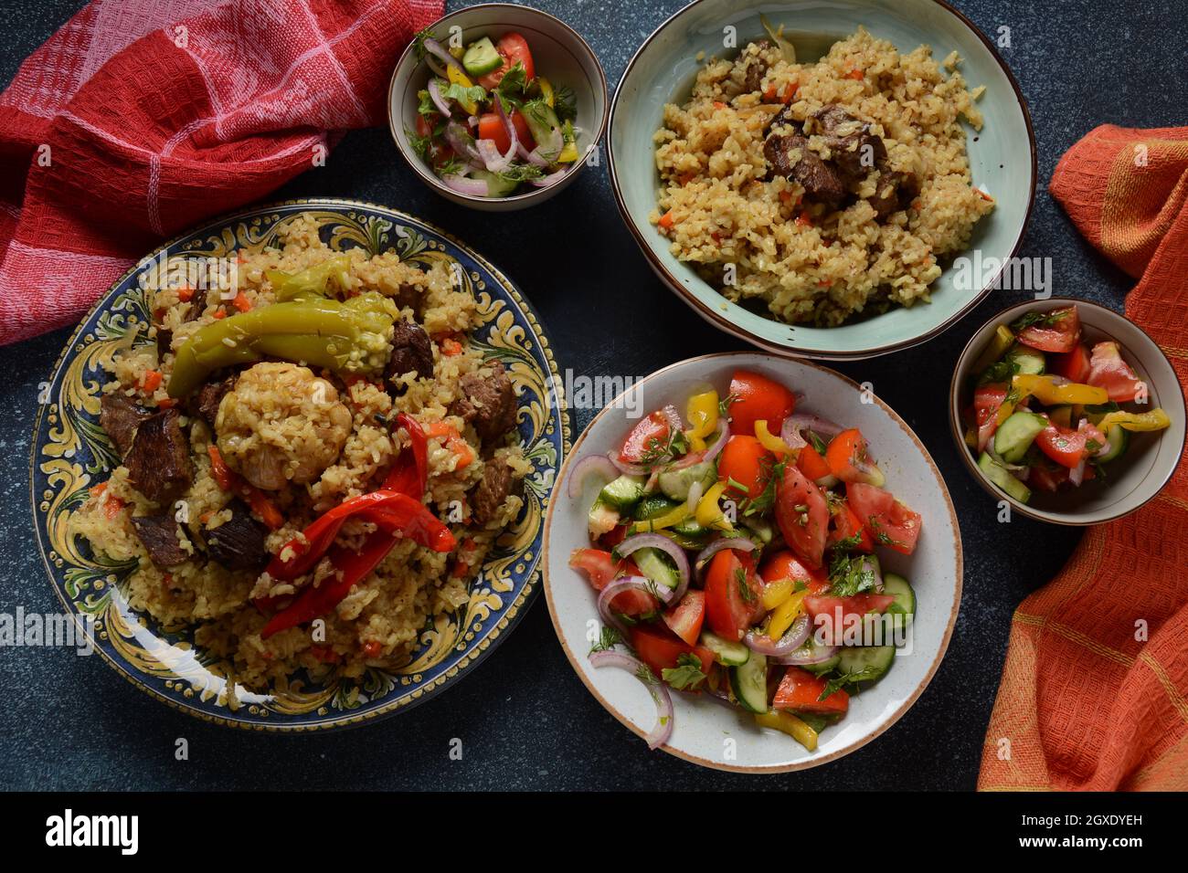 Uzbek cuisine (food) pilaf (plov), salad achichuk (achuchuk).Mutton ...