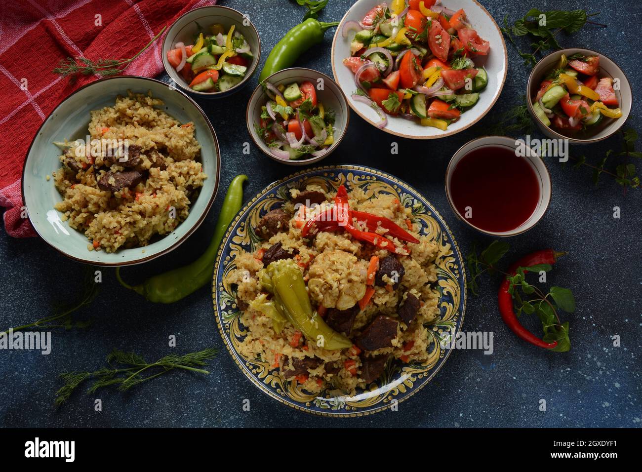 Uzbek cuisine (food) pilaf (plov), salad achichuk (achuchuk).Mutton ...