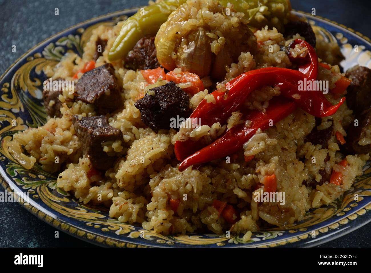 Uzbek cuisine (food) pilaf (plov).Mutton, rice, carrots, vegetable oil ...