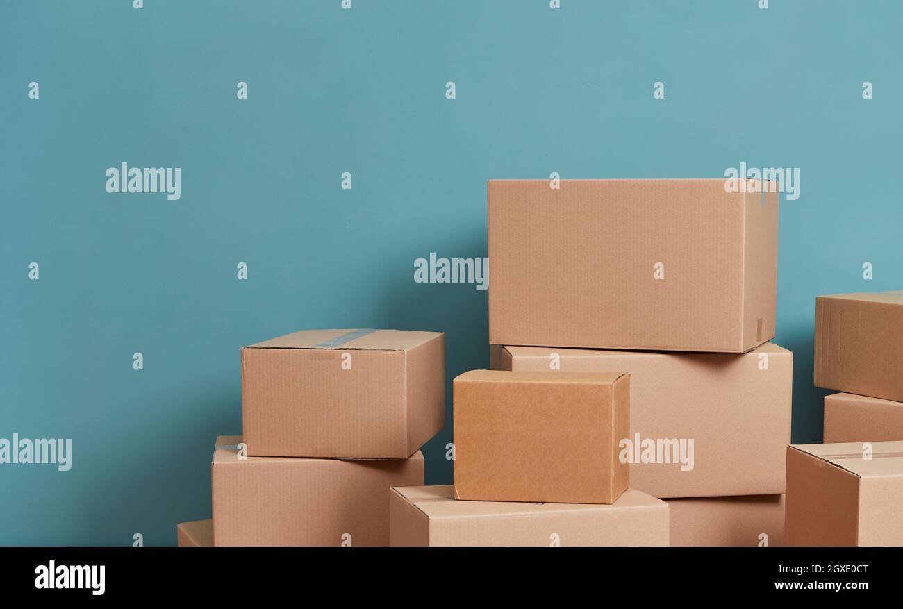 Cardboard boxes in room Stock Photo - Alamy