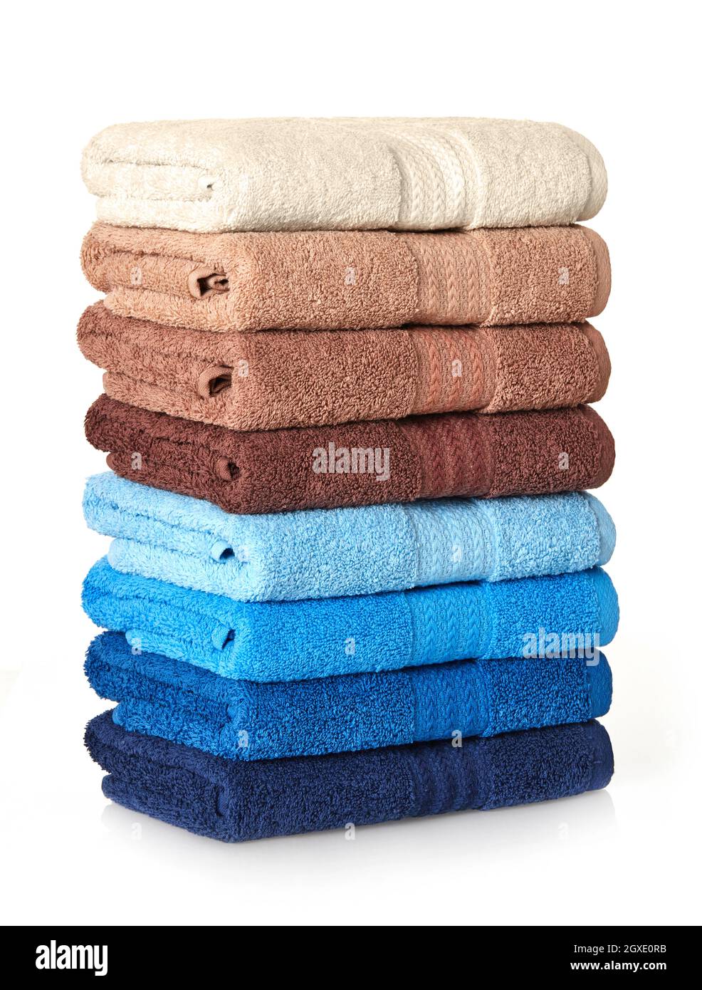 Folded stack of towels on white background Stock Photo - Alamy