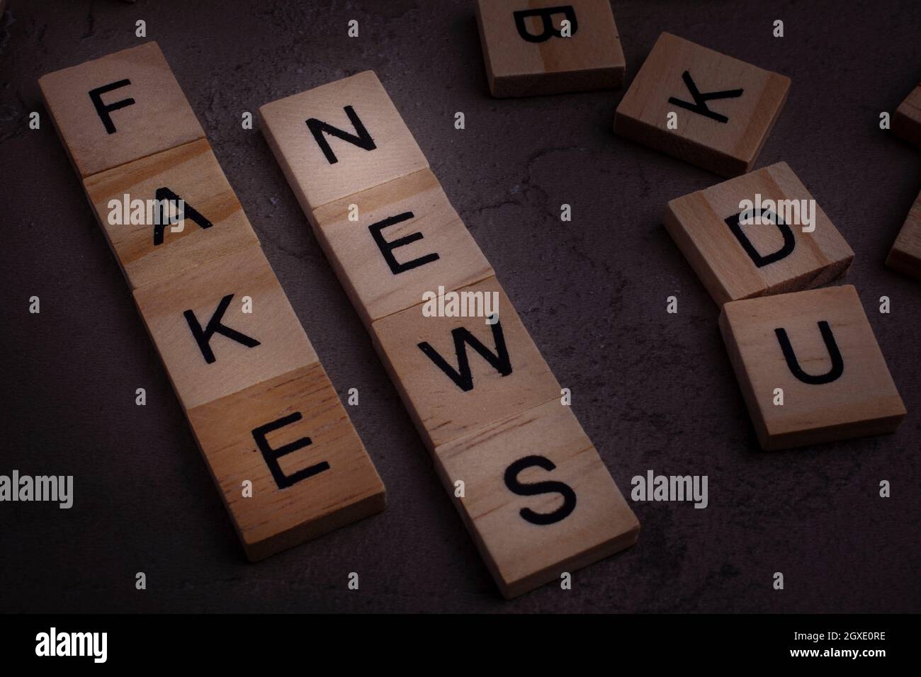 Top view of wooden blocks with letters -text fake news Stock Photo - Alamy