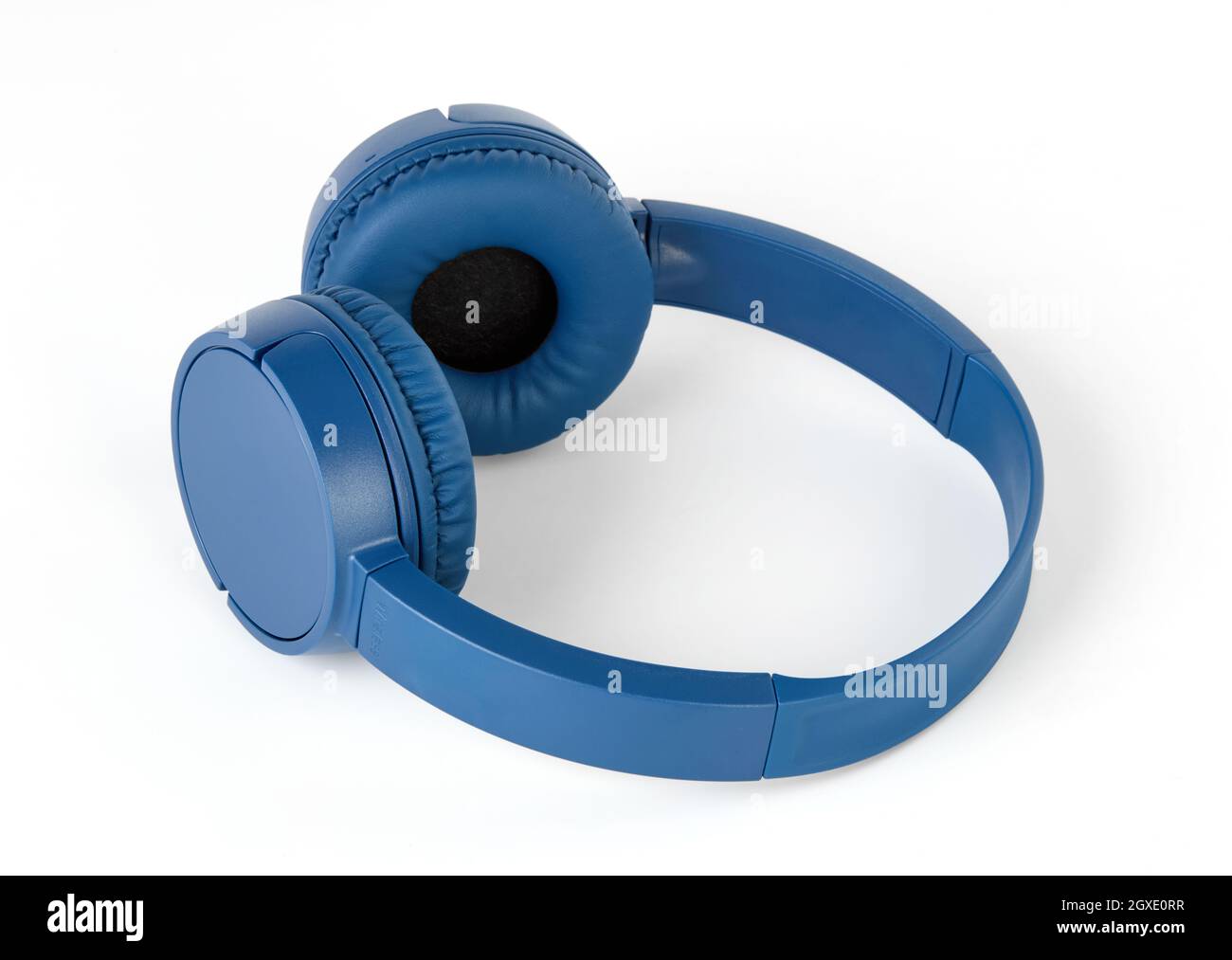 Wireless blue headphones on white background Stock Photo - Alamy