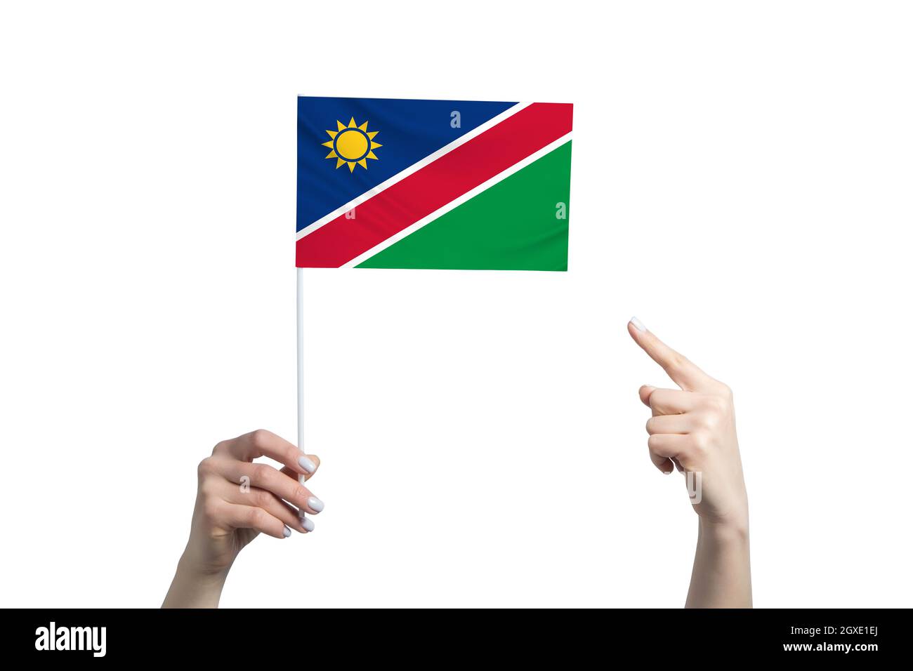 A beautiful female hand holds a Namibia flag to which she shows the ...