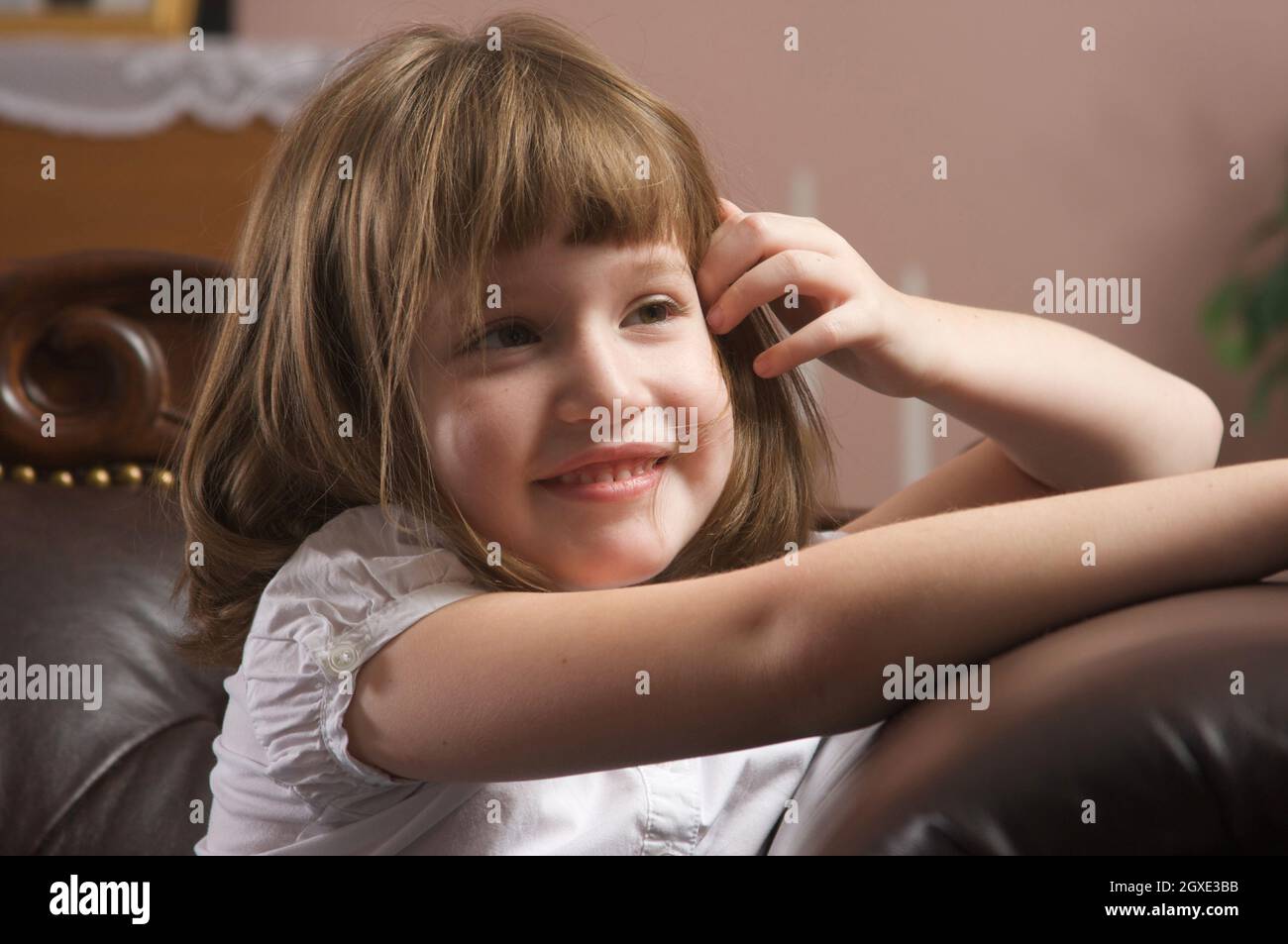Adorable Girl Poses for a Fun Portrait Stock Photo - Alamy