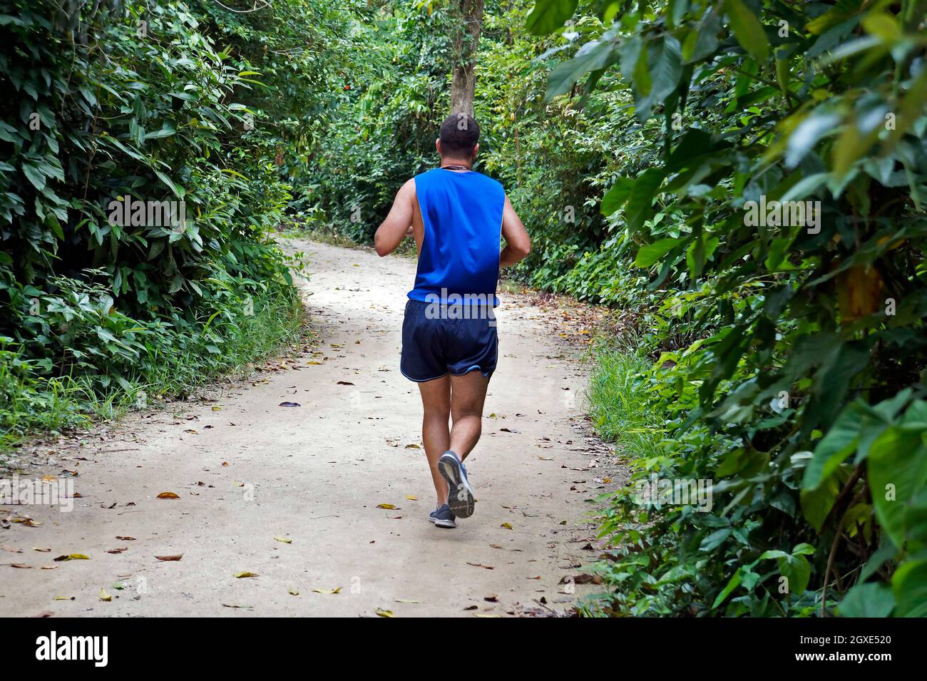 RIO DE JANEIRO, BRAZIL - DECEMBER 21, 2019: Man running on trail at ...
