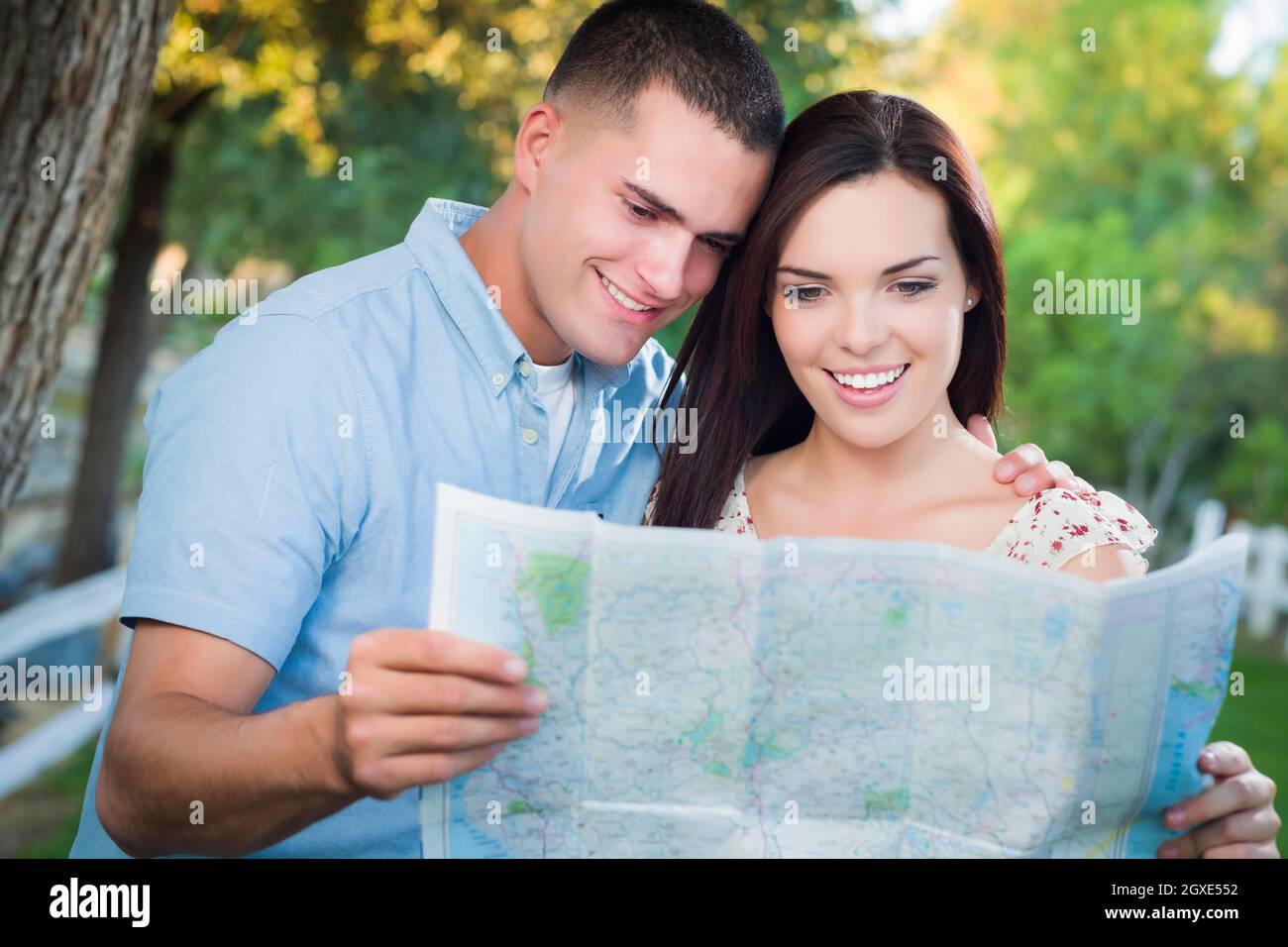 Two people looking over a map hi-res stock photography and images - Alamy