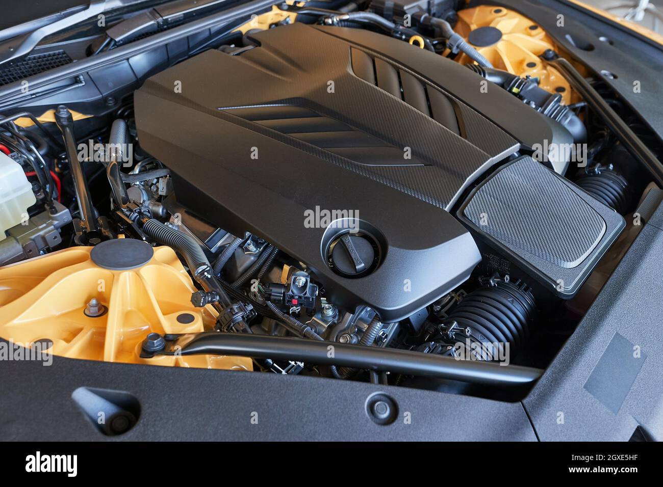 Engine bay of a sports car with powerful V8 engine Stock Photo - Alamy