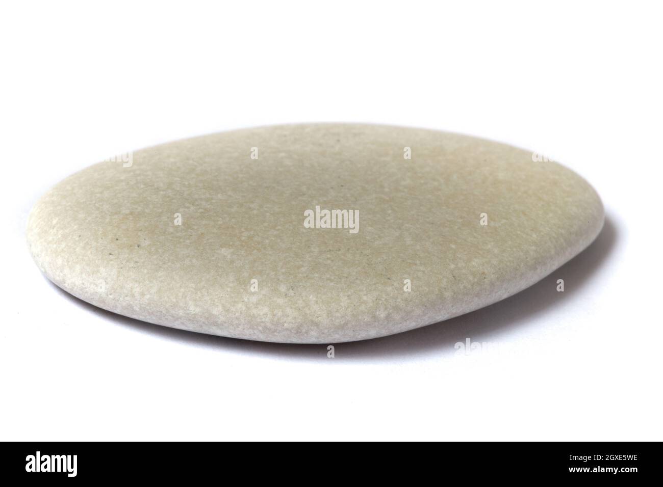 natural stone with shadow isolated on white background. sea pebbles ...