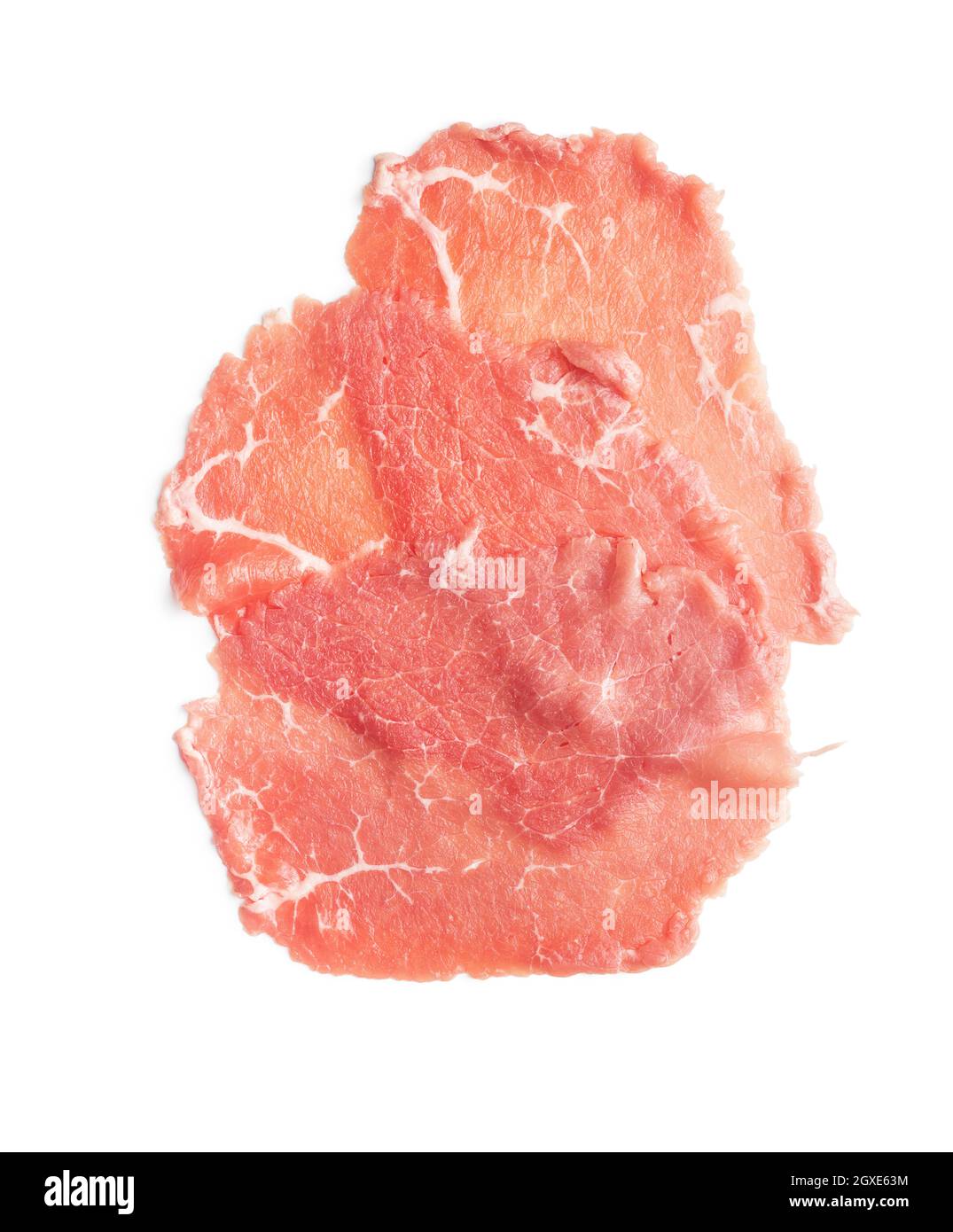 Sliced carpaccio. Raw beef meat isolated on white background Stock ...