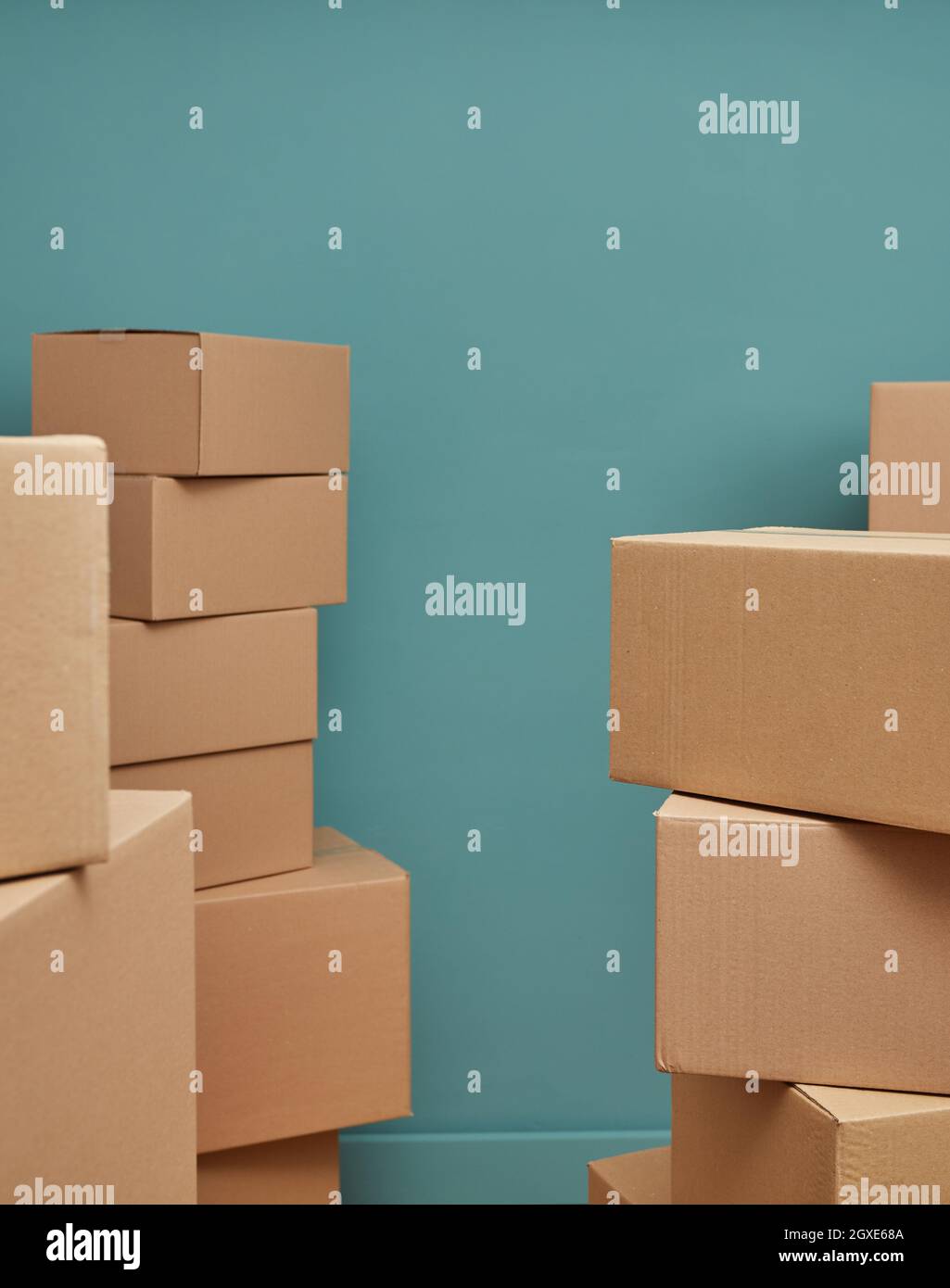 Cardboard boxes in room Stock Photo - Alamy