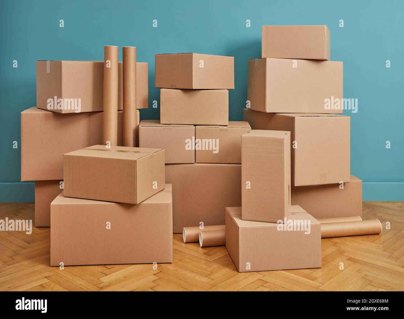 Cardboard boxes in room Stock Photo - Alamy