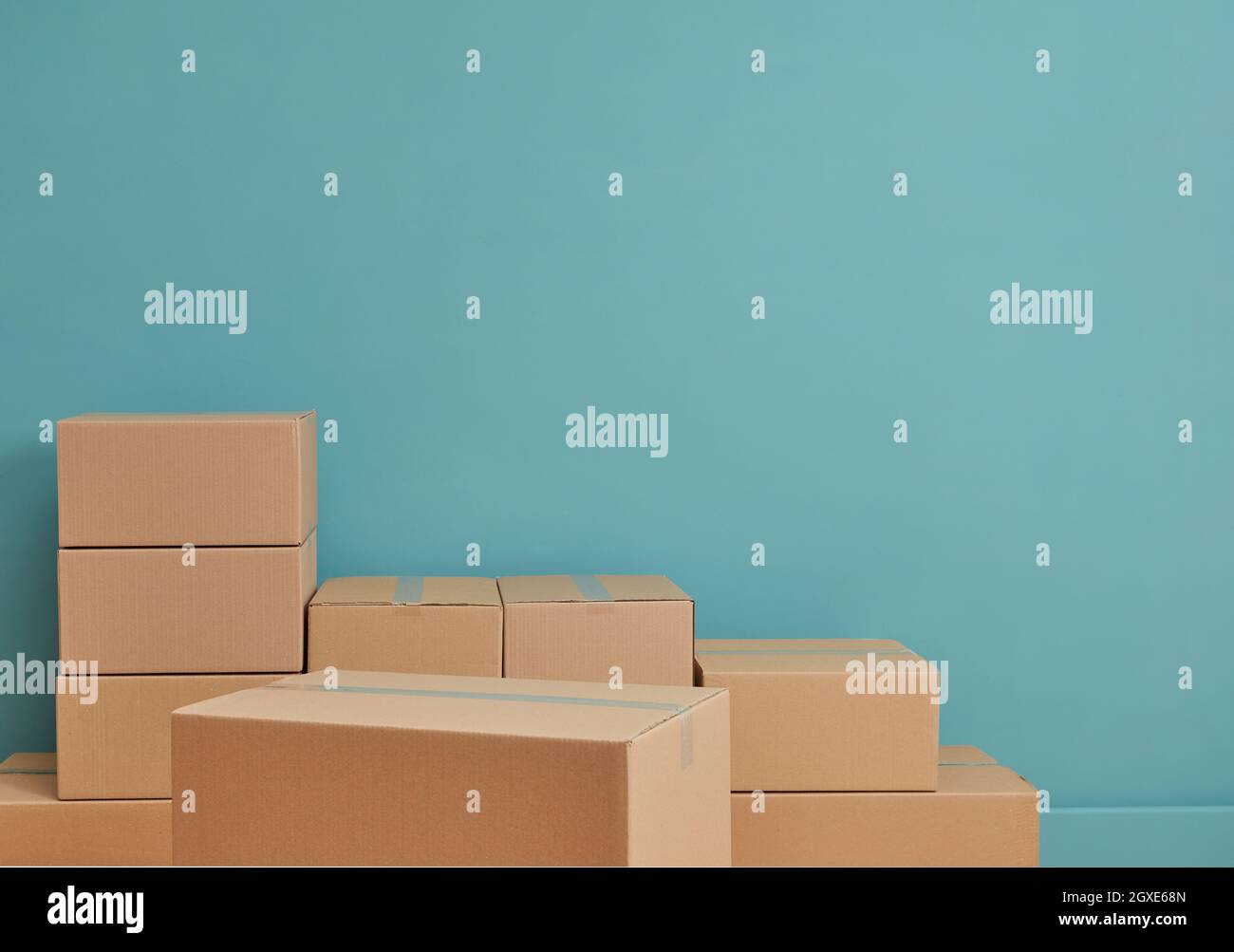 Cardboard boxes in room Stock Photo - Alamy