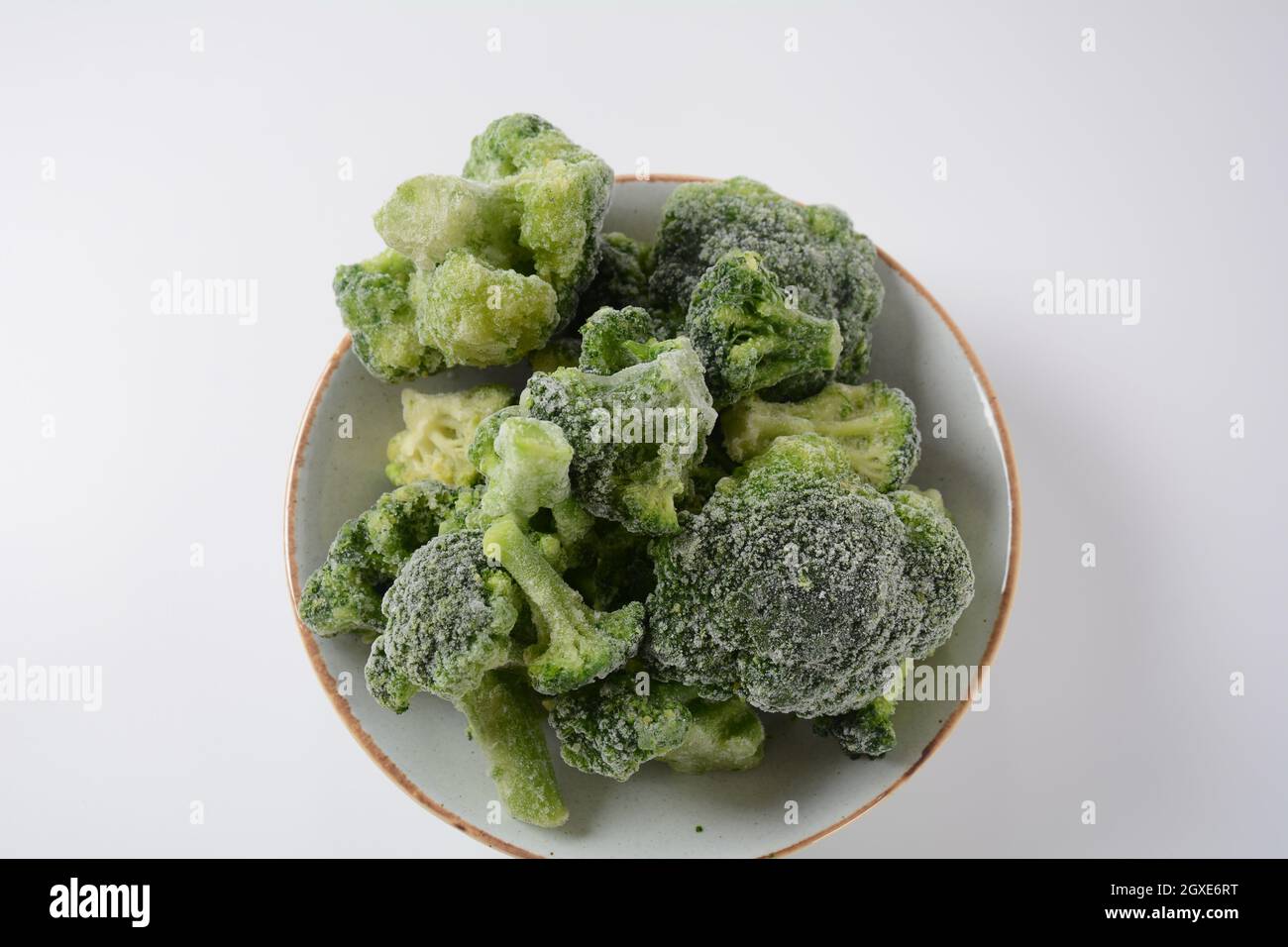 Small frozen broccoli pieces. Healthy food. Frozen vegetables Stock ...