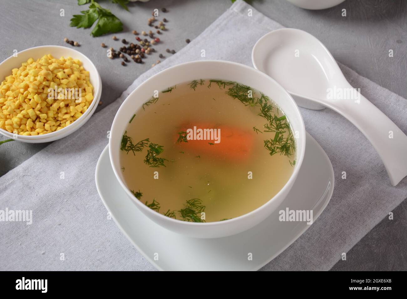 Chicken soup , chicken broth, with pieces of chicken and vegetables and ...