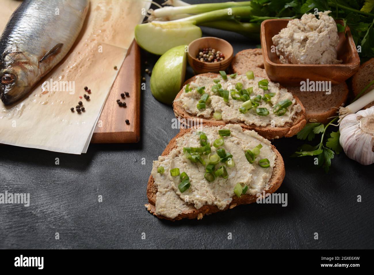 Traditional Jewish snack vorschmack or forshmak with bread and green ...