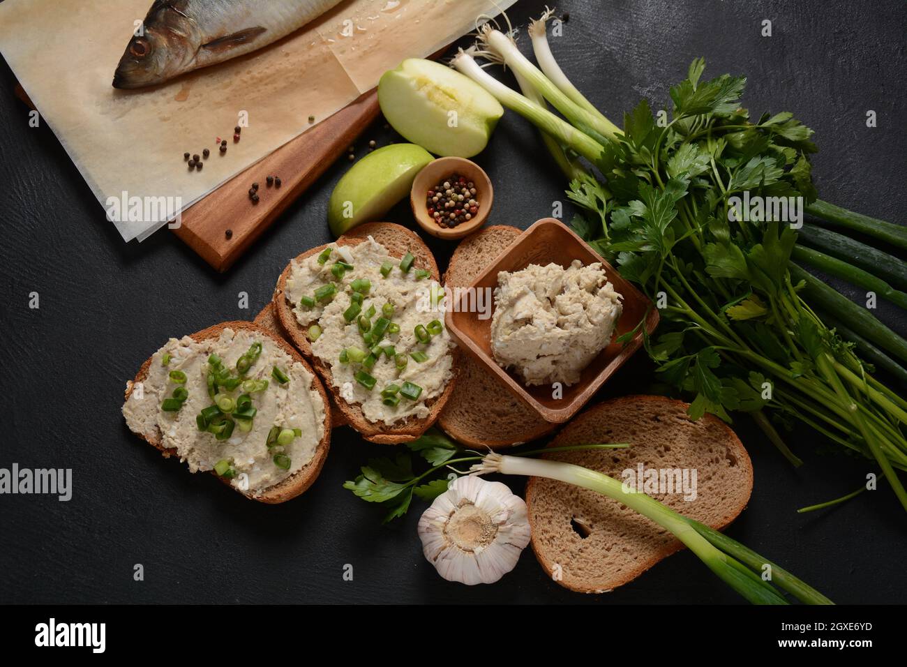 Traditional Jewish snack vorschmack or forshmak with bread and green ...