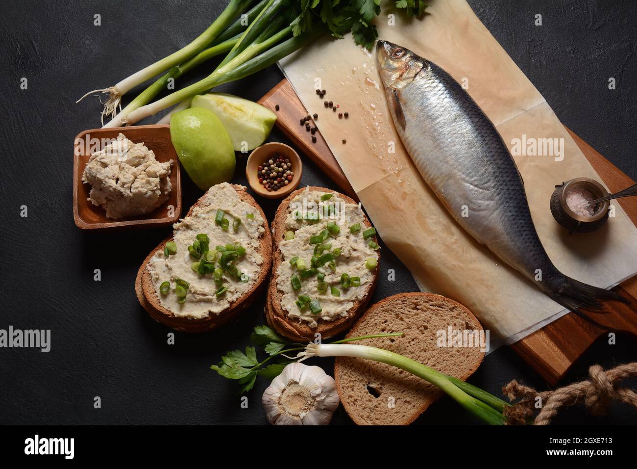 Traditional Jewish snack vorschmack or forshmak with bread and green ...