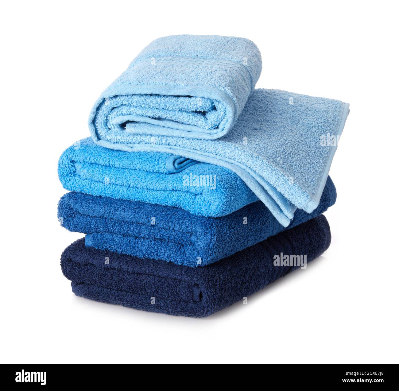 Folded stack of towels on white background Stock Photo - Alamy