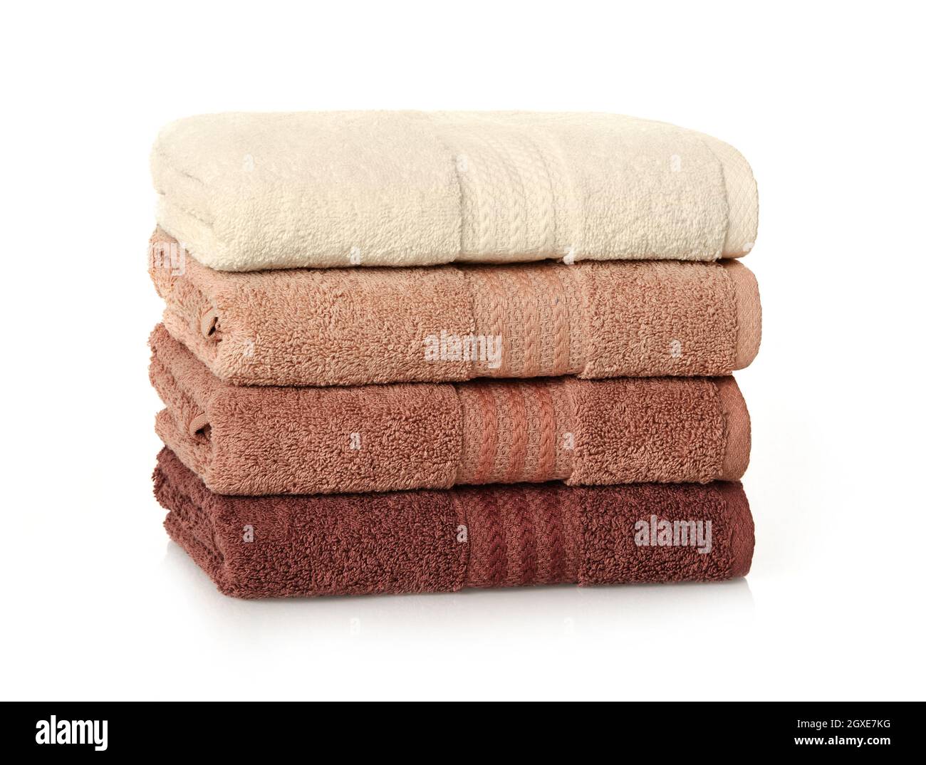 Folded stack of towels on white background Stock Photo - Alamy