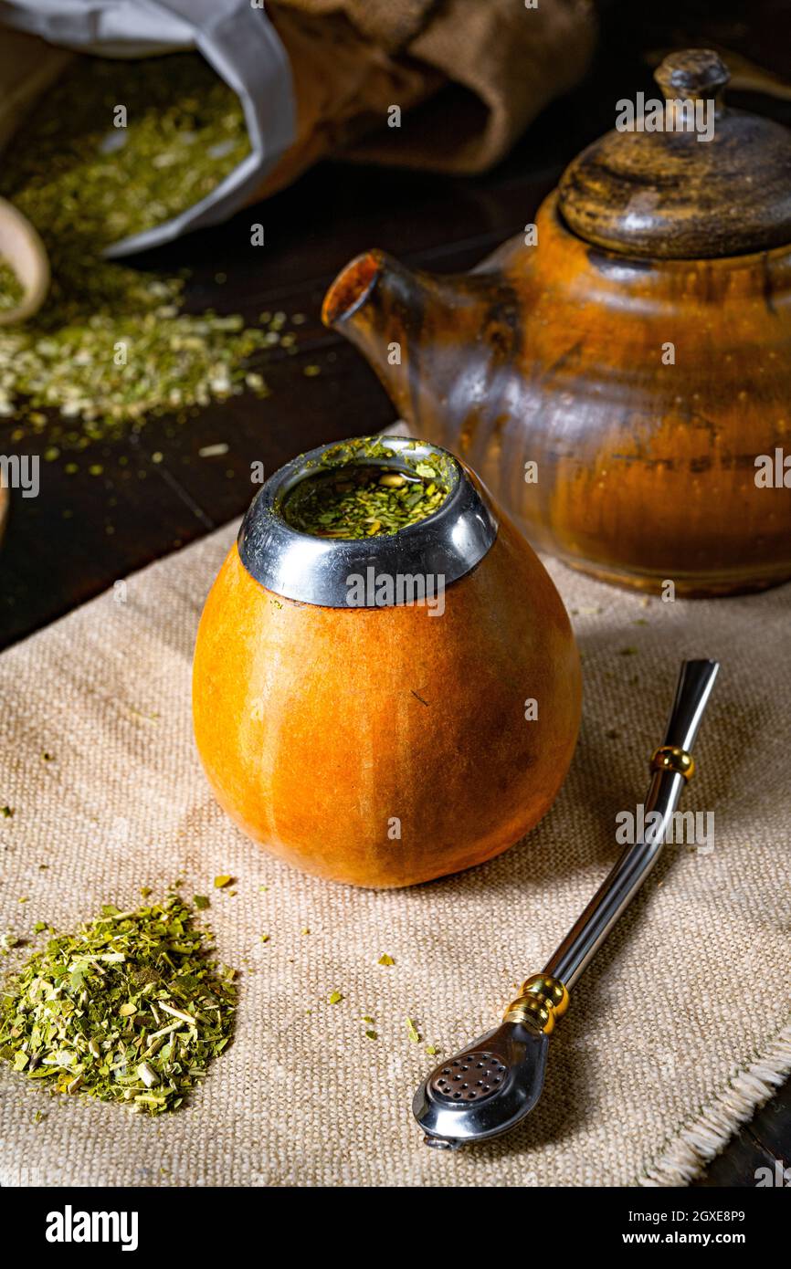Prepare yerba mate with calabash and bombilla Stock Photo - Alamy
