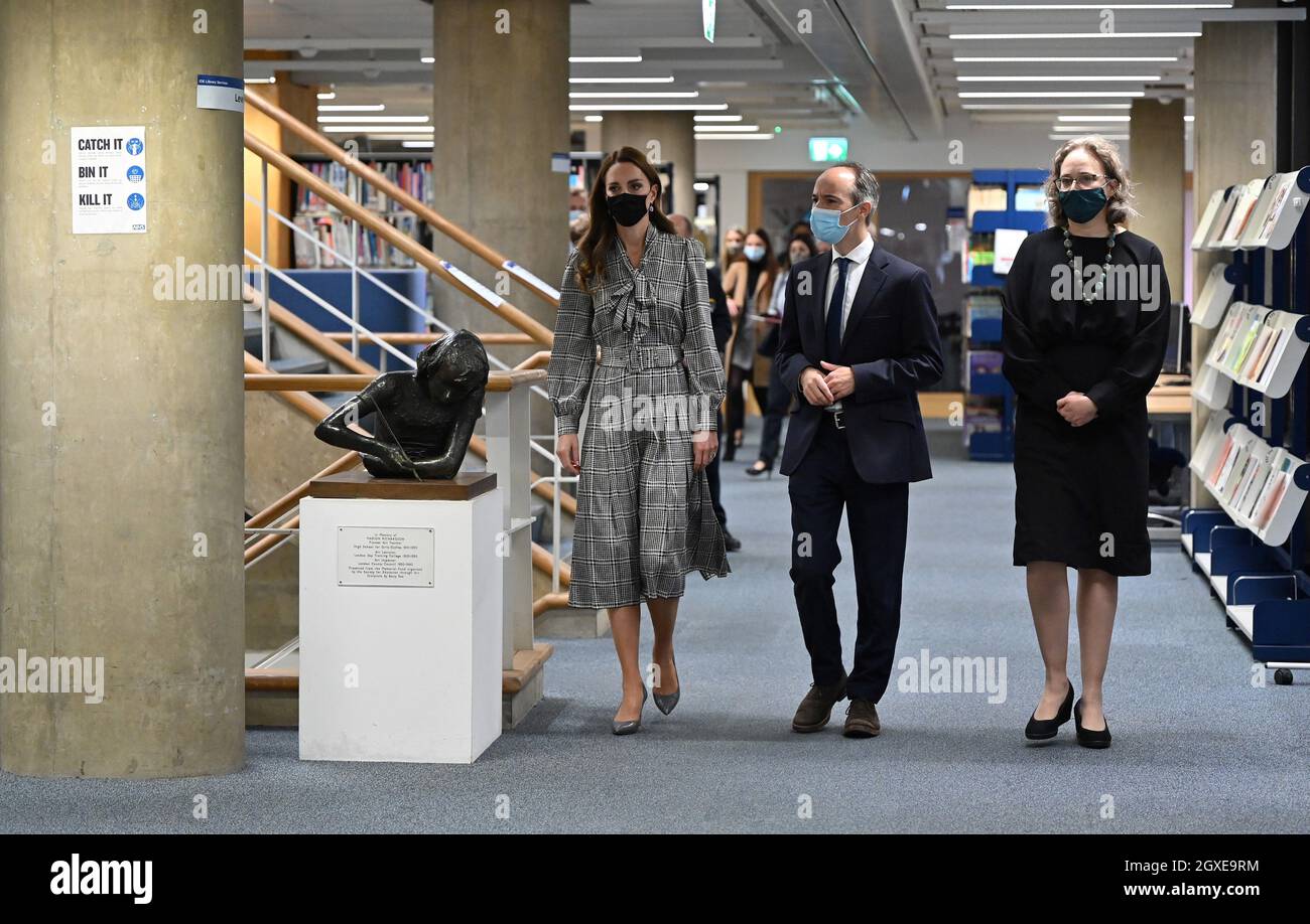 The Duchess of Cambridge alongside Professor Pasco Fearon (centre) and ...