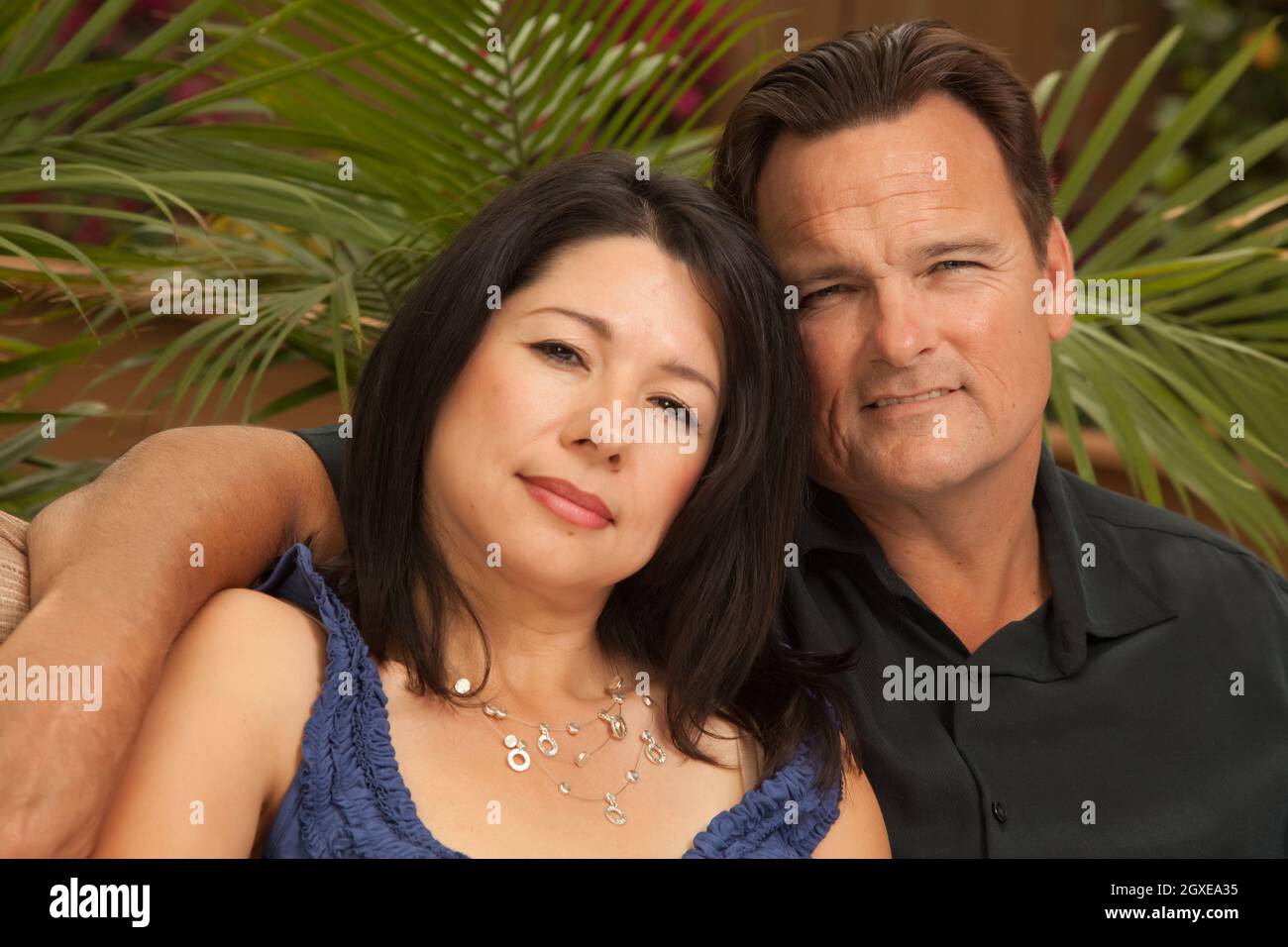 Happy Attractive Hispanic and Caucasian Couple Portrait Stock Photo - Alamy
