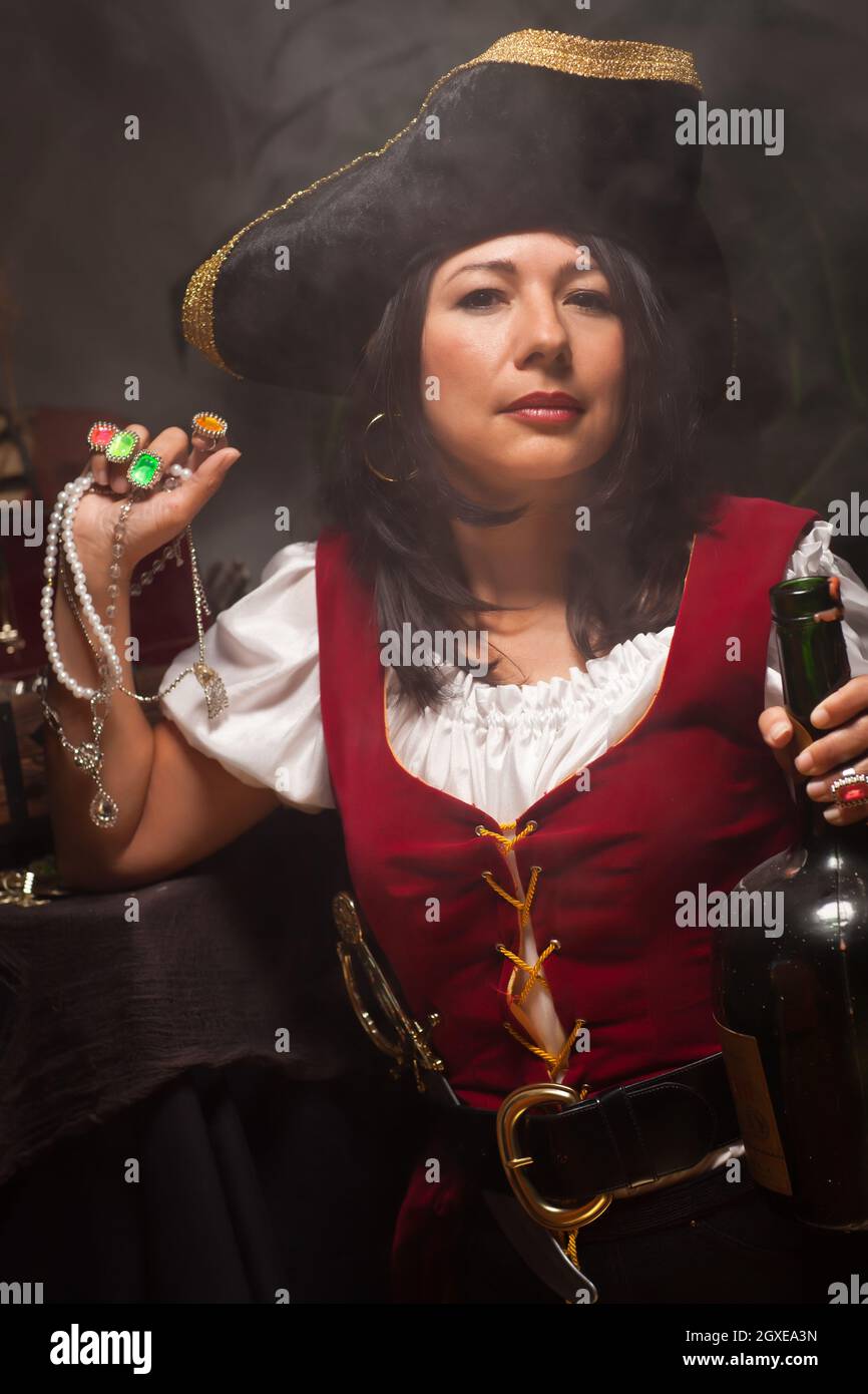Dramatic Female Pirate in a Dimly Lit Moody Scene Stock Photo - Alamy