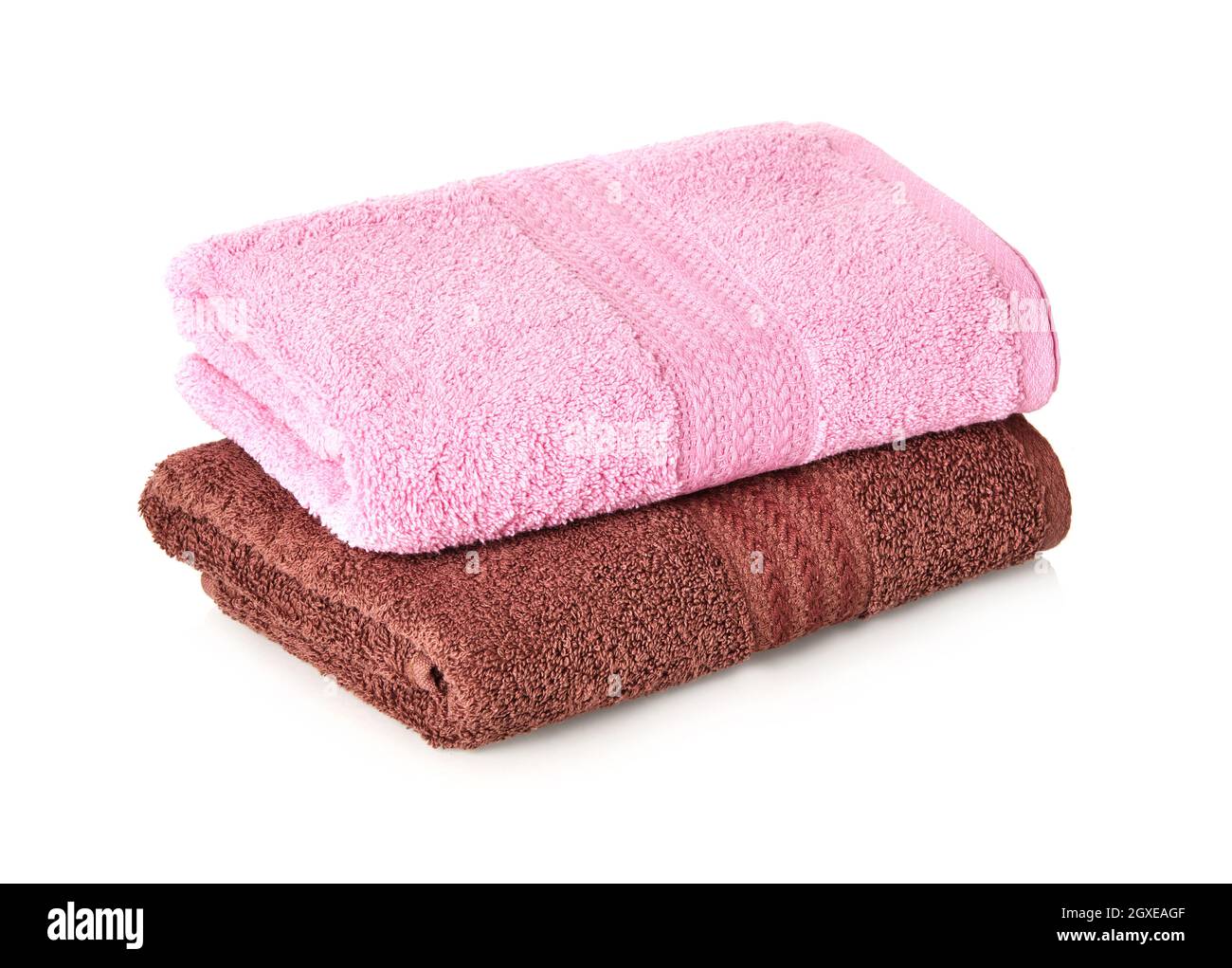 Folded stack of towels on white background Stock Photo - Alamy