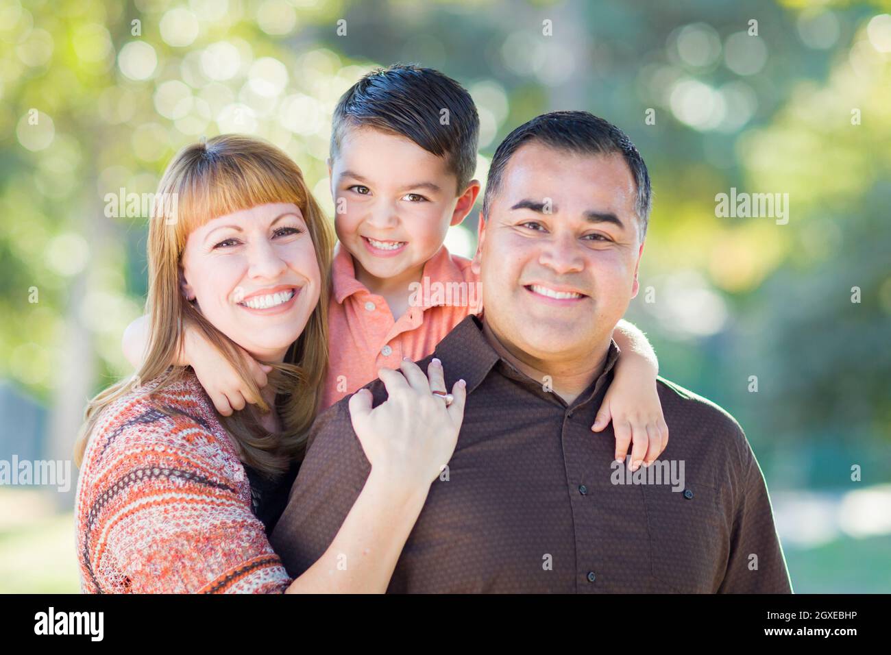 Happy Attractive Young Mixed Race Family Portrait Outdoors Stock Photo ...