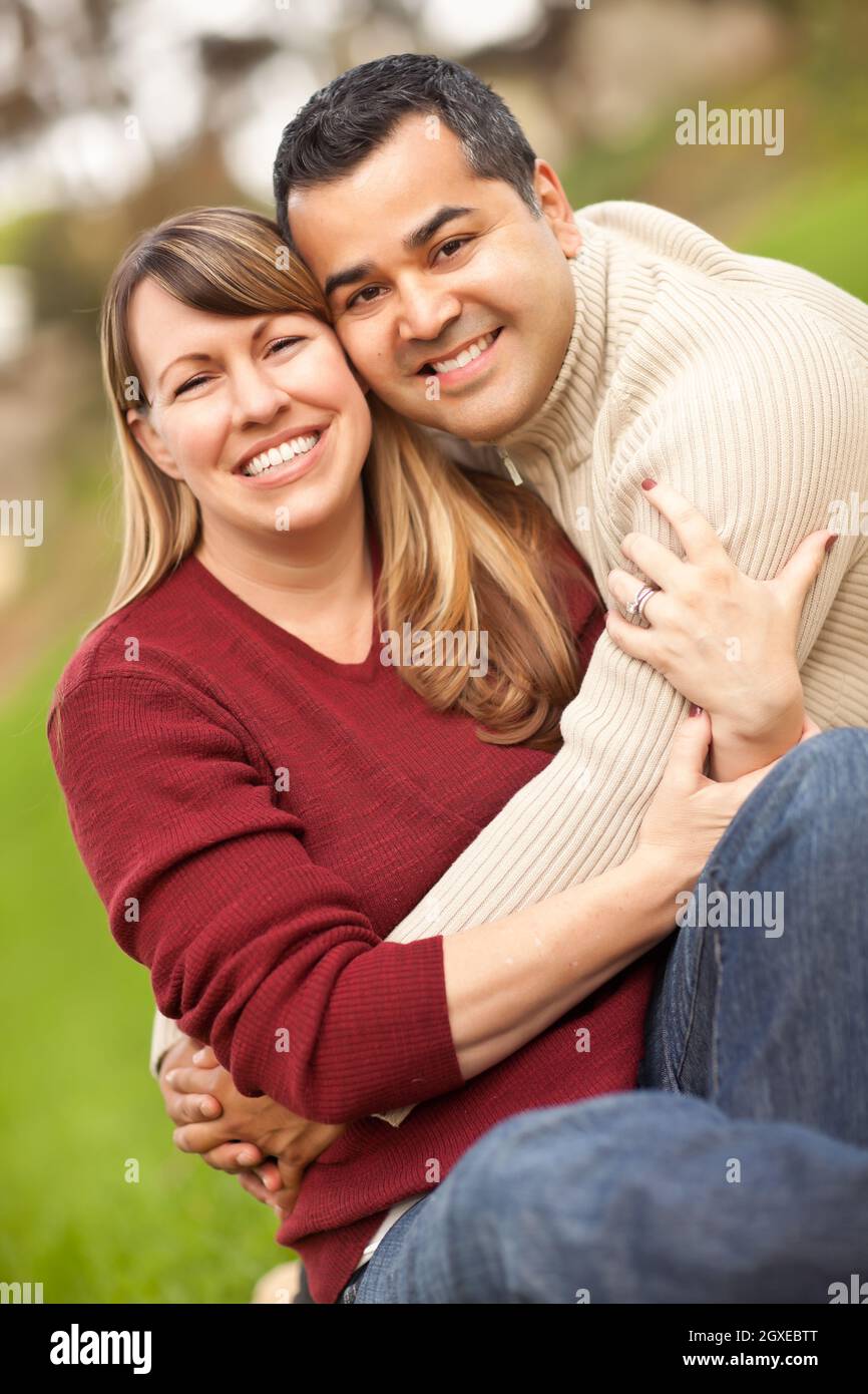 Attractive Mixed Race Couple Portrait in the Park Stock Photo - Alamy