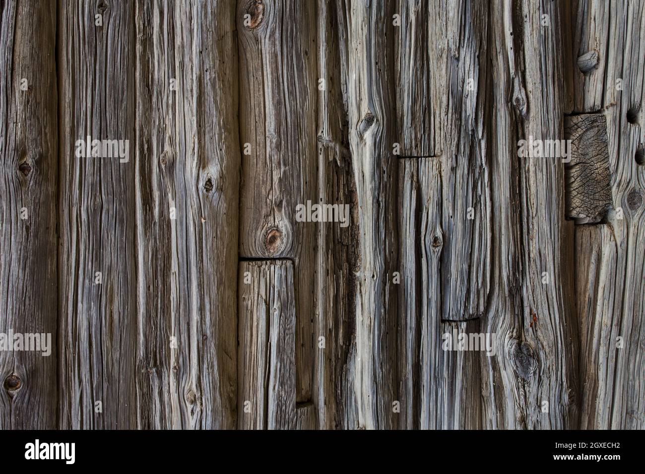 Wooden logs of an old house. Close-up. Weathered natural gray wood ...