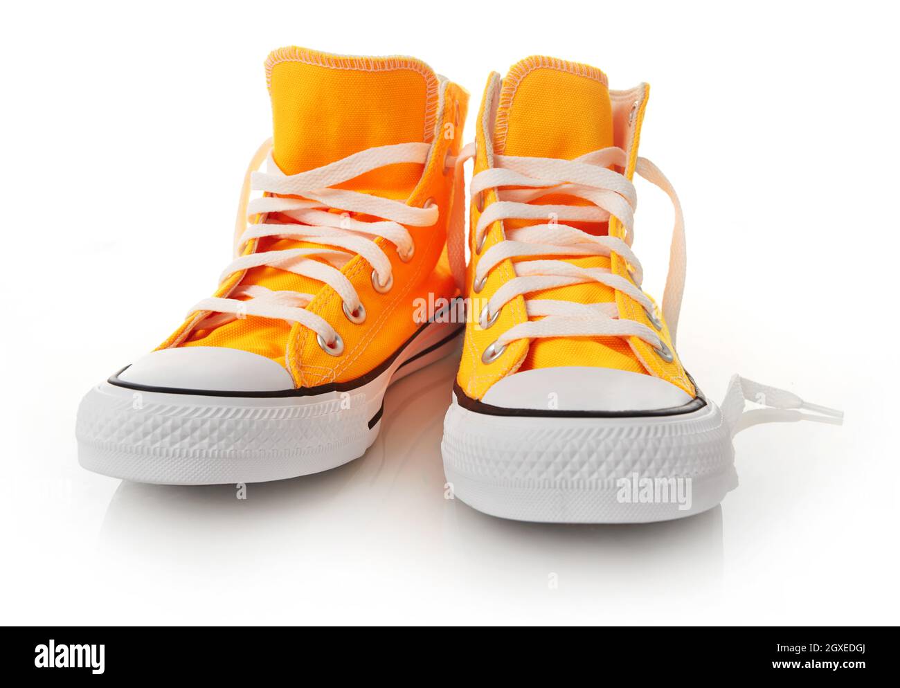 Yellow sneakers isolated on white Stock Photo - Alamy