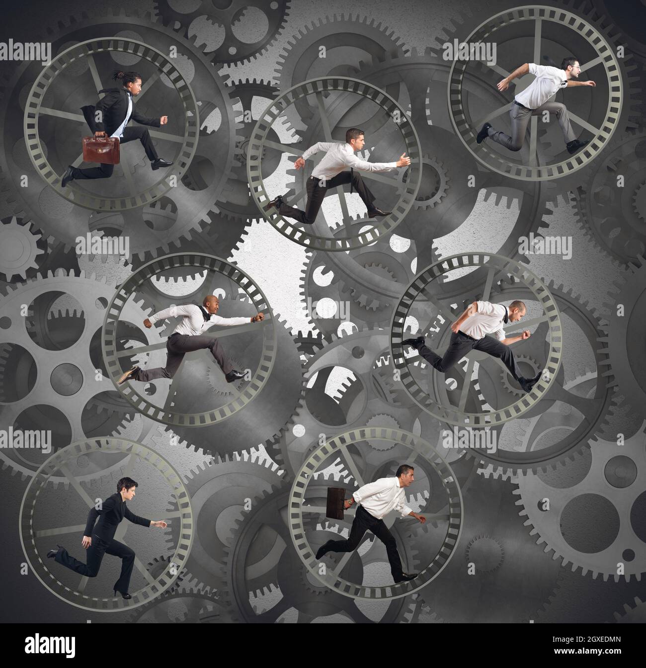Businesspeople as gear parts of a machine Stock Photo - Alamy