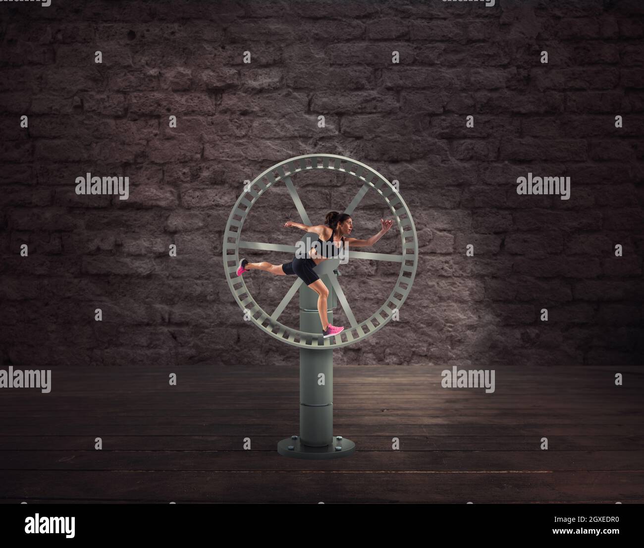 Athletic woman runs in a looping wheel like a hamster. concept of sport ...