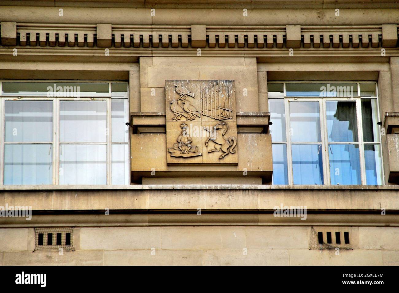 Close up view of an old building near London Eye, is a giant Ferris ...