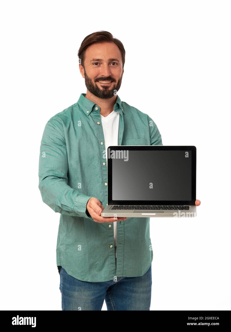 Young man with laptop, white background Stock Photo - Alamy