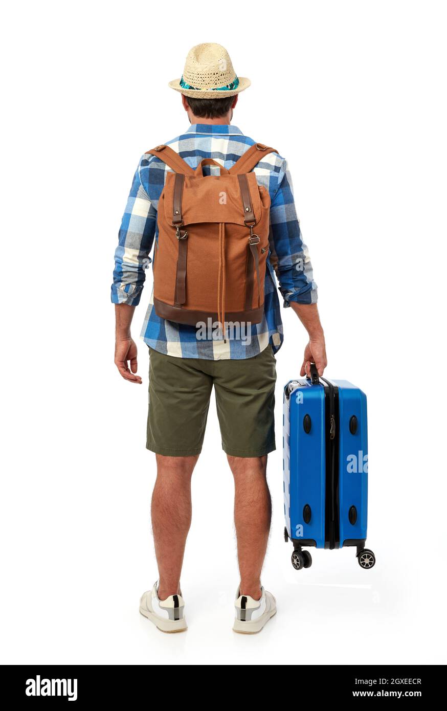 Man from behind with suitcase and backpack Stock Photo - Alamy