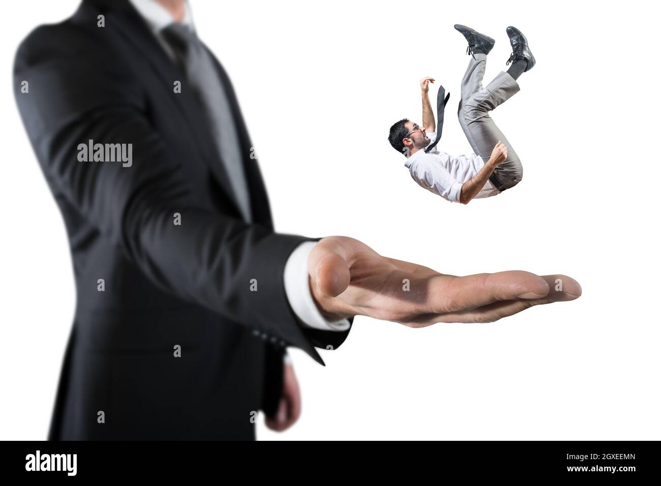 Falling businessman is saved from a big hand. Concept of business ...