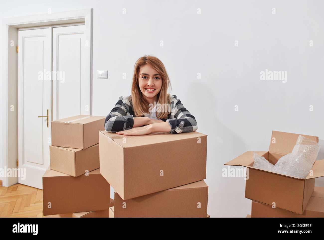 One woman carefree box home hi-res stock photography and images - Alamy