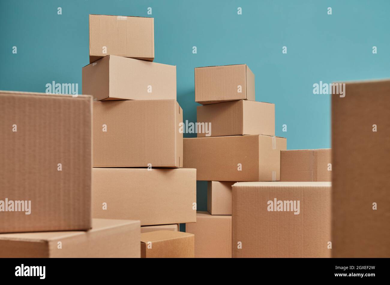 Cardboard boxes in room Stock Photo - Alamy