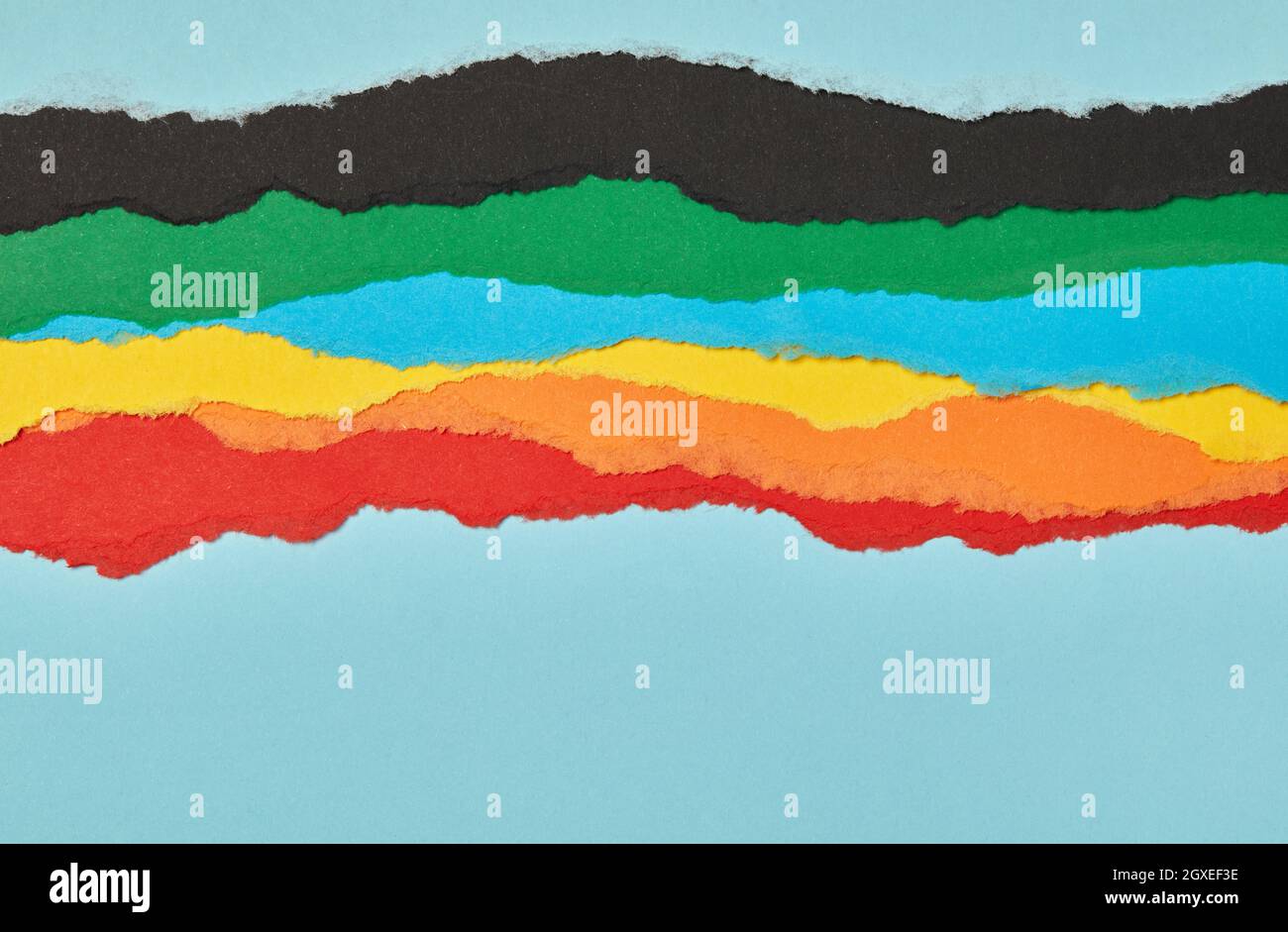 Multi-colored torn paper background Stock Photo - Alamy