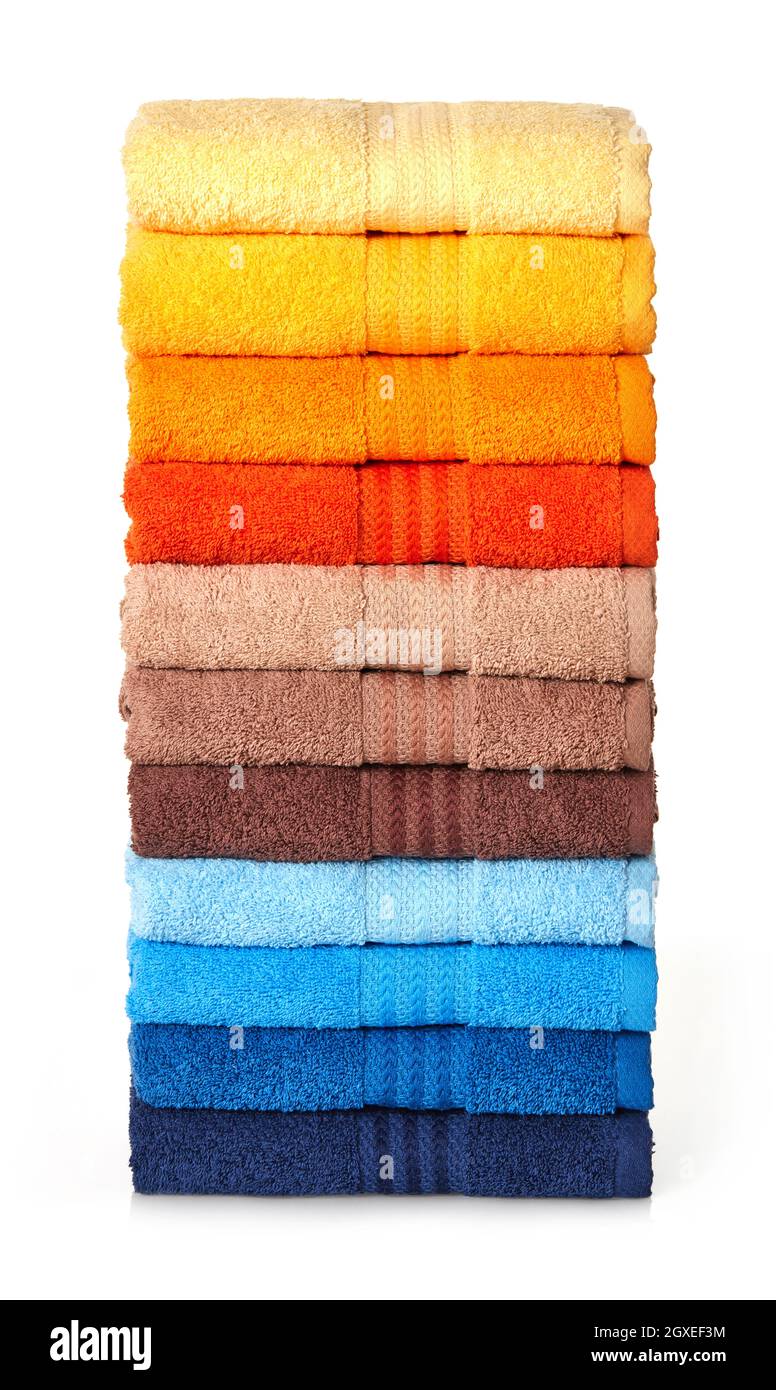 Folded stack of towels on white background Stock Photo - Alamy