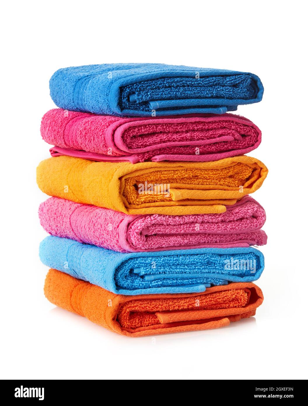 Colorful towels stack on white background Stock Photo - Alamy