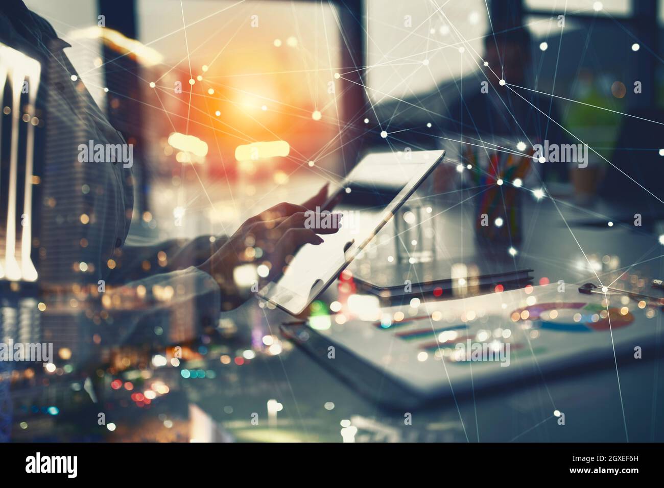 Businesswoman works in office with a tablet during a meeting. Concept ...